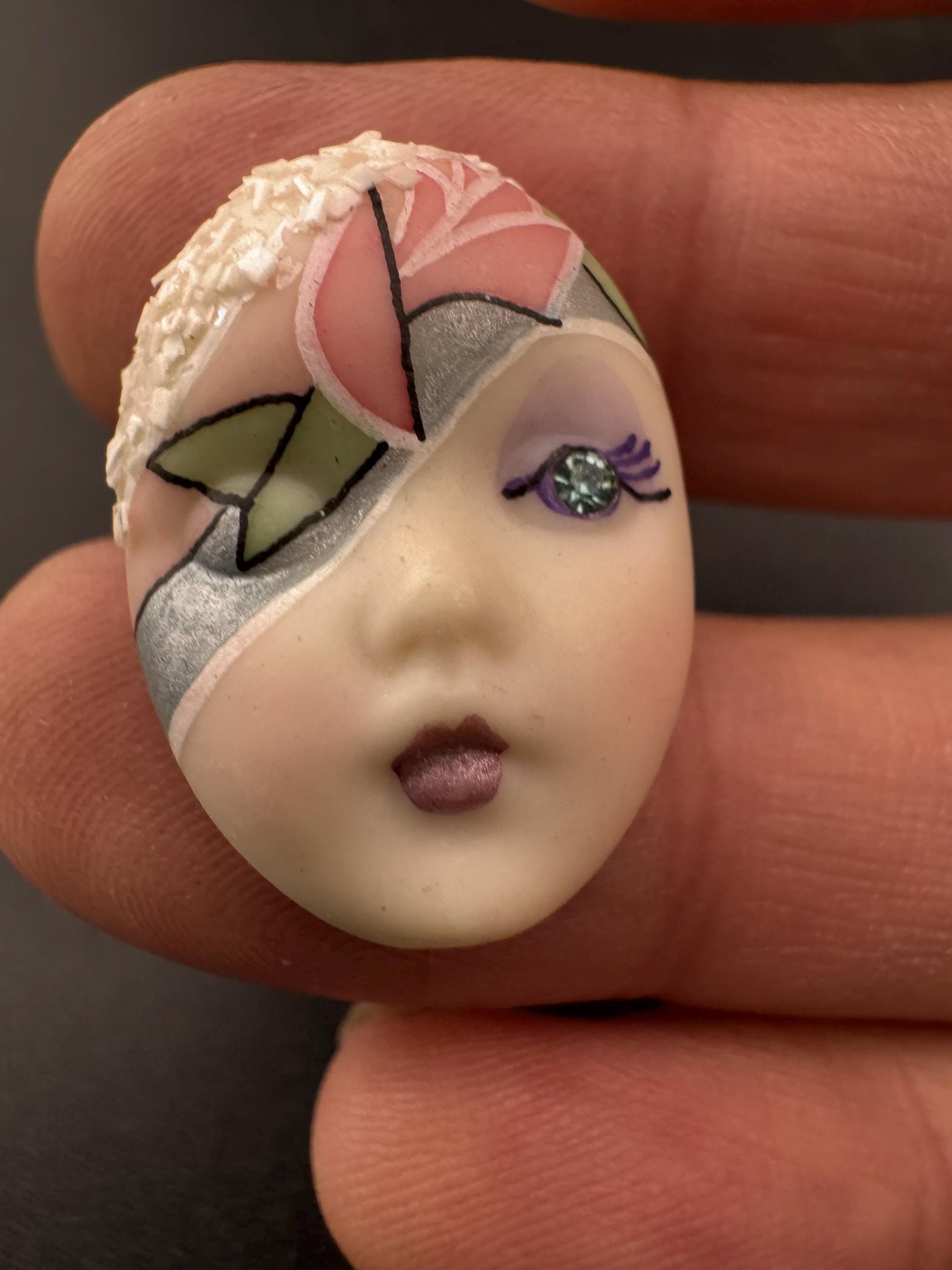 Vintage small signed ceramic flapper face brooch: art deco